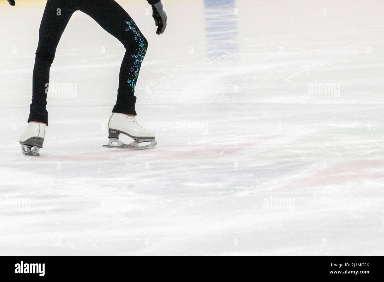 View of figure skater feet at the figure skating practice Stock Photo ...