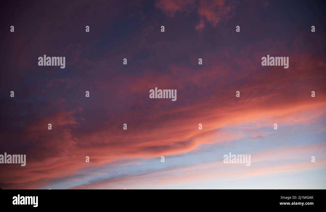 sunset sky blue sky clouds Stock Photo - Alamy