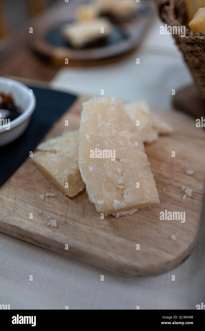 Tasting of different matured and very old parmesan Italian Parmigiano ...