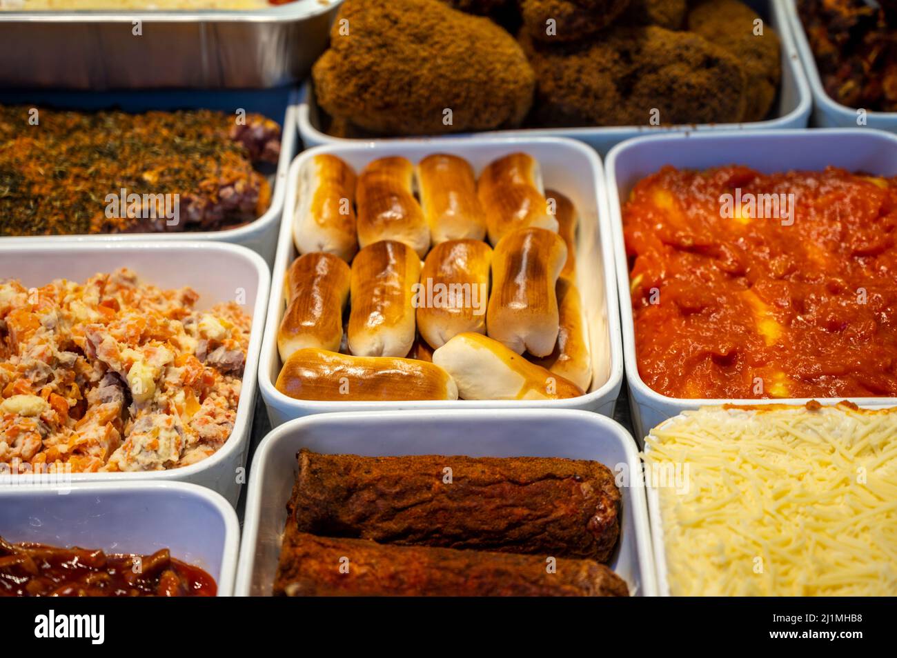 Assortment of gourmet meat dishes in butchery delicatessen shop, food ...