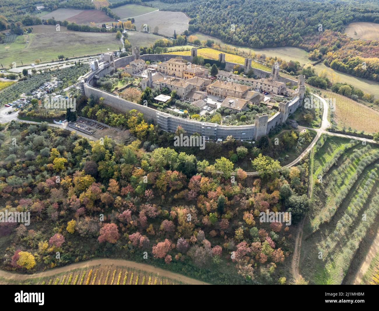 Aeriel view on round medieval fortress town on hilltop Monteriggione in ...