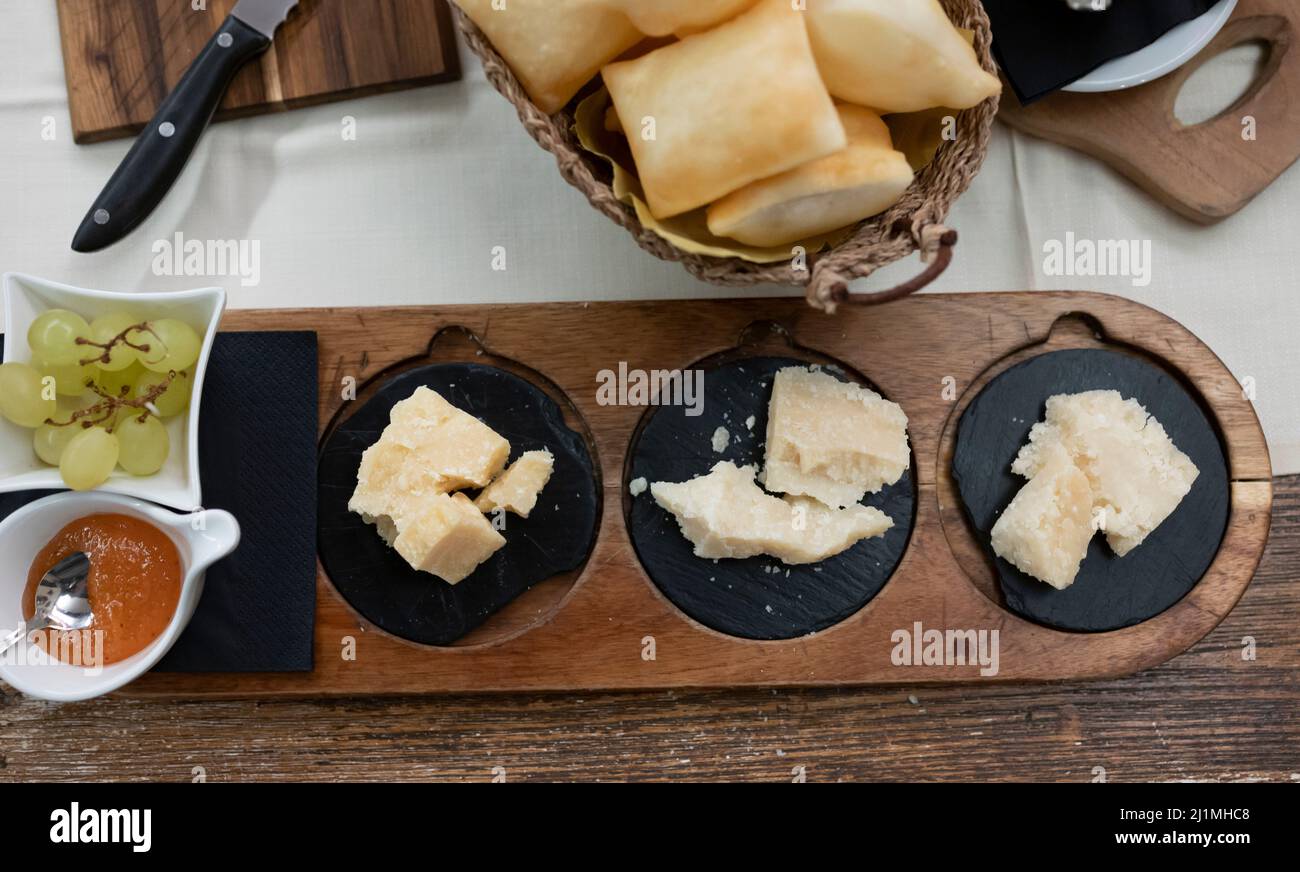 Tasting of different matured and very old parmesan Italian Parmigiano ...