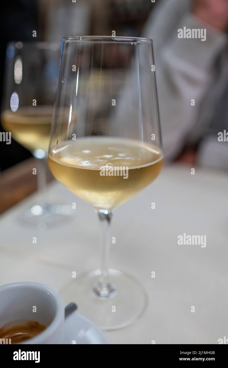 Dinner with sweet cold muscat white desert wine in traditional Italian ...