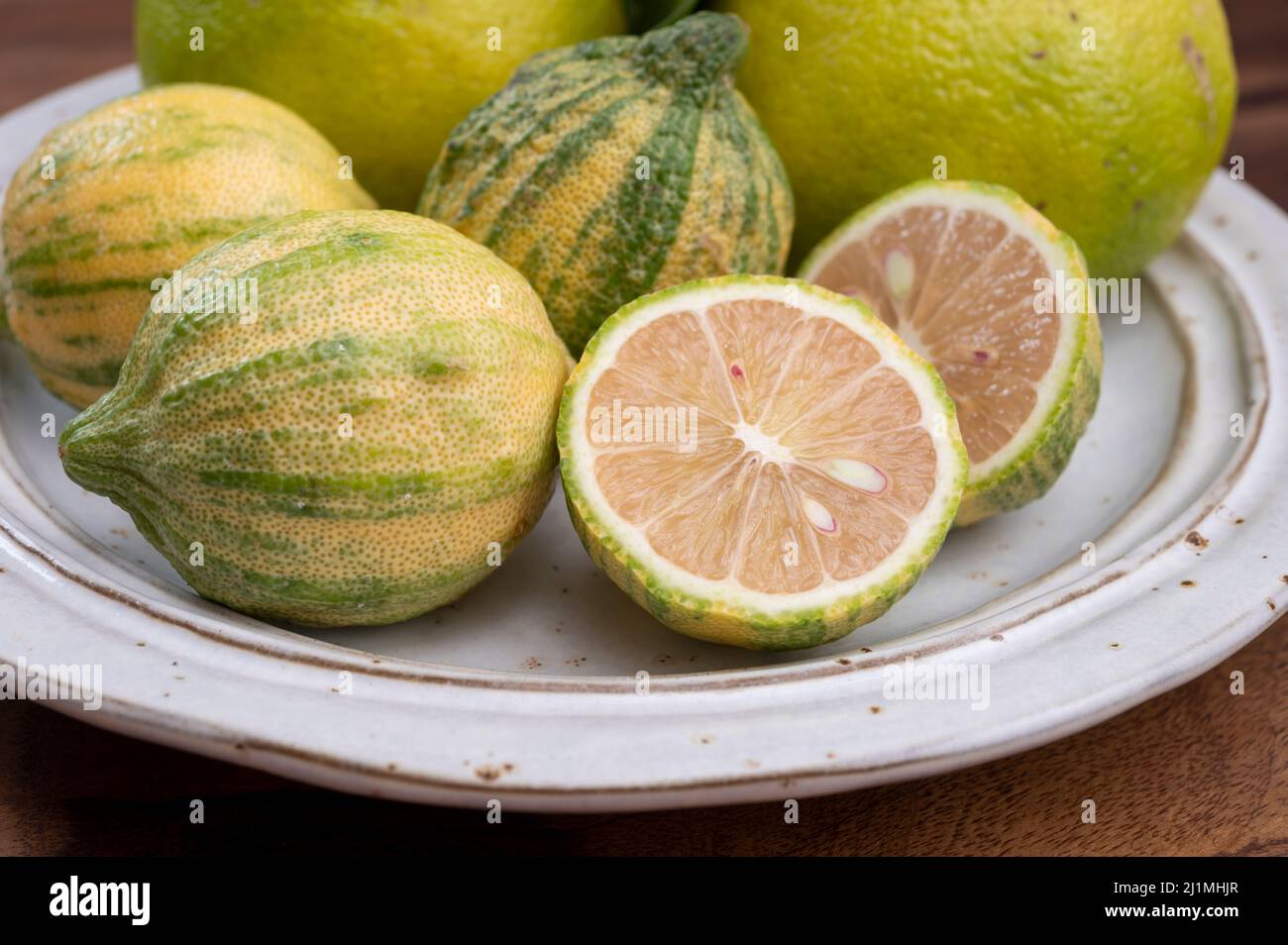 Fresh ripe bergamot citrus fruit and pink tiger lemons close up Stock ...