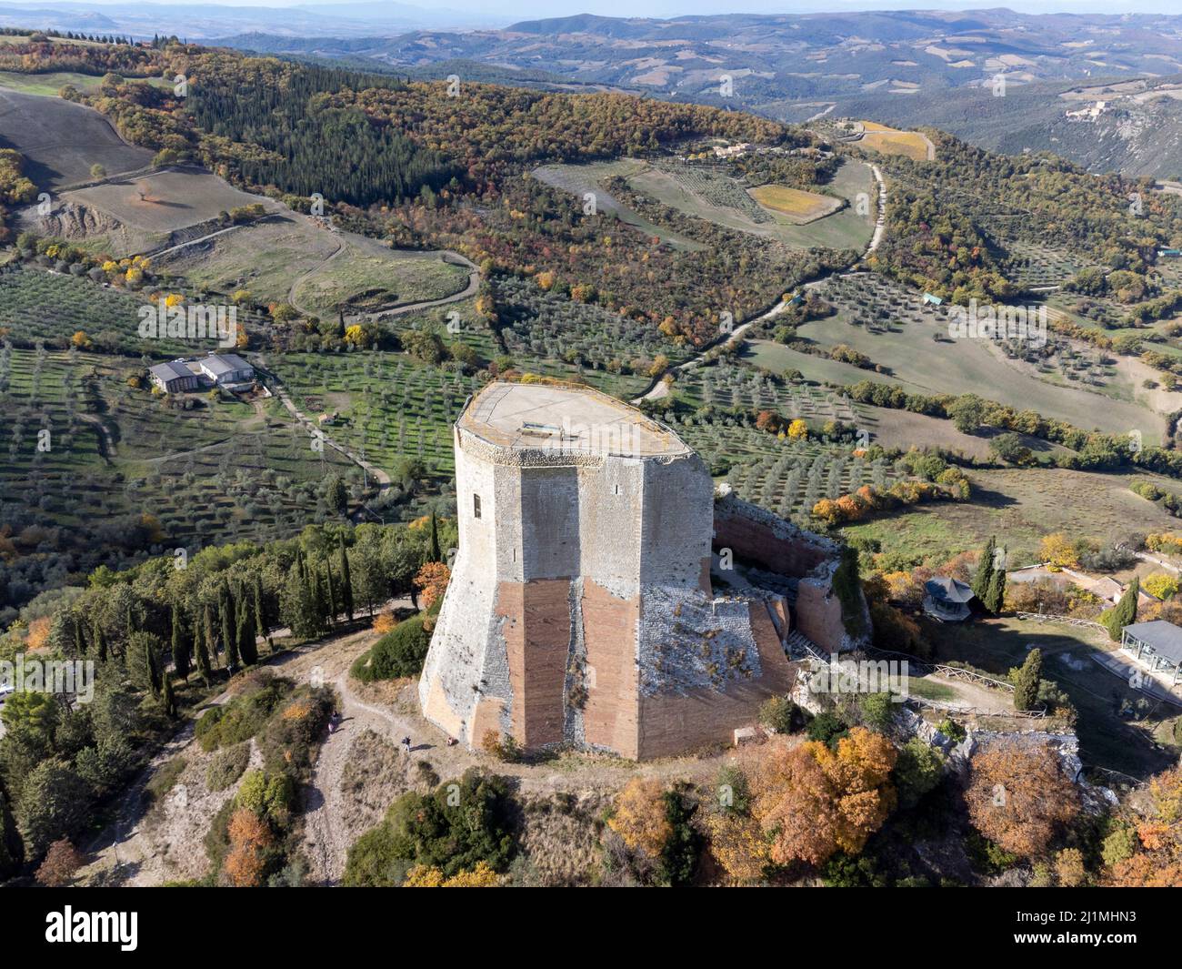 Medieval fortification castle on hilltop and view on hills in Tuscany ...