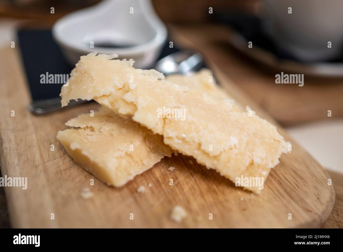 Tasting of different matured and very old parmesan Italian Parmigiano ...