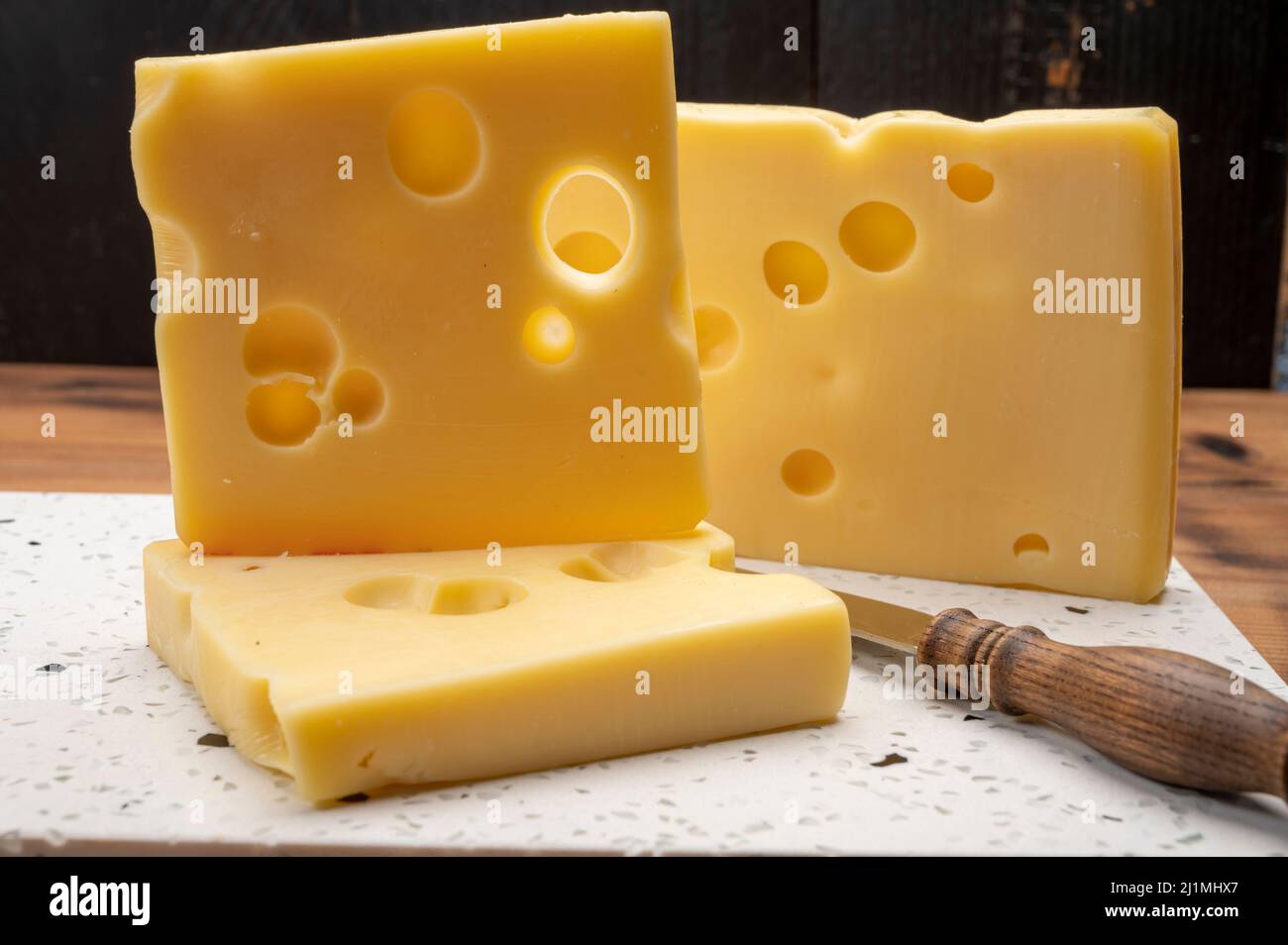 Swiss cheese collection, yellow emmentaler or emmental cheese with ...