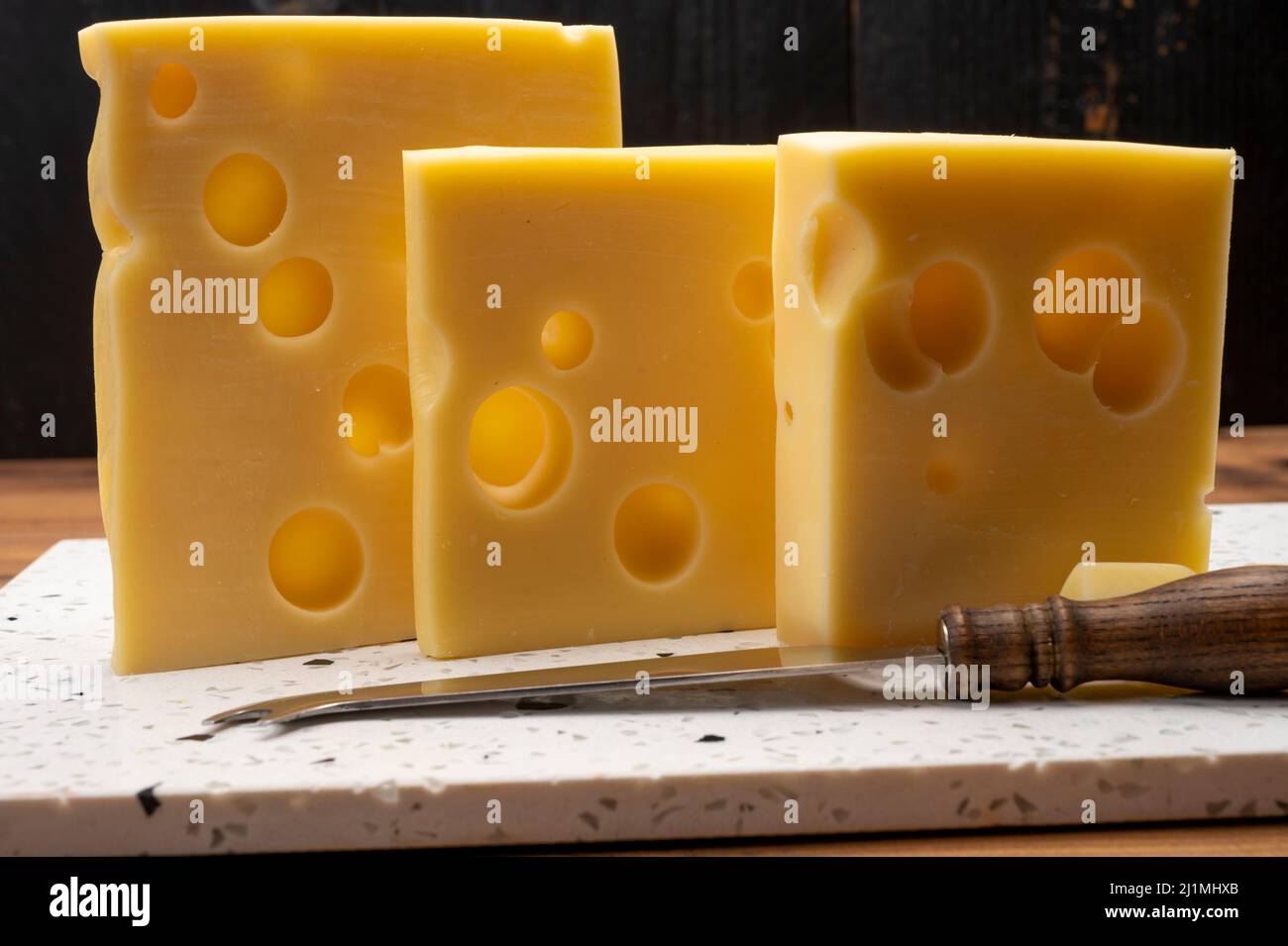 Swiss cheese collection, yellow emmentaler or emmental cheese with ...