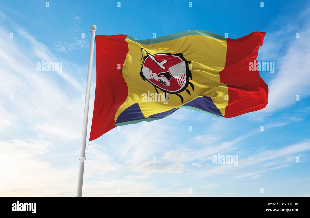 flag of Stoney Nakoda Nation , Canada at cloudy sky background on ...