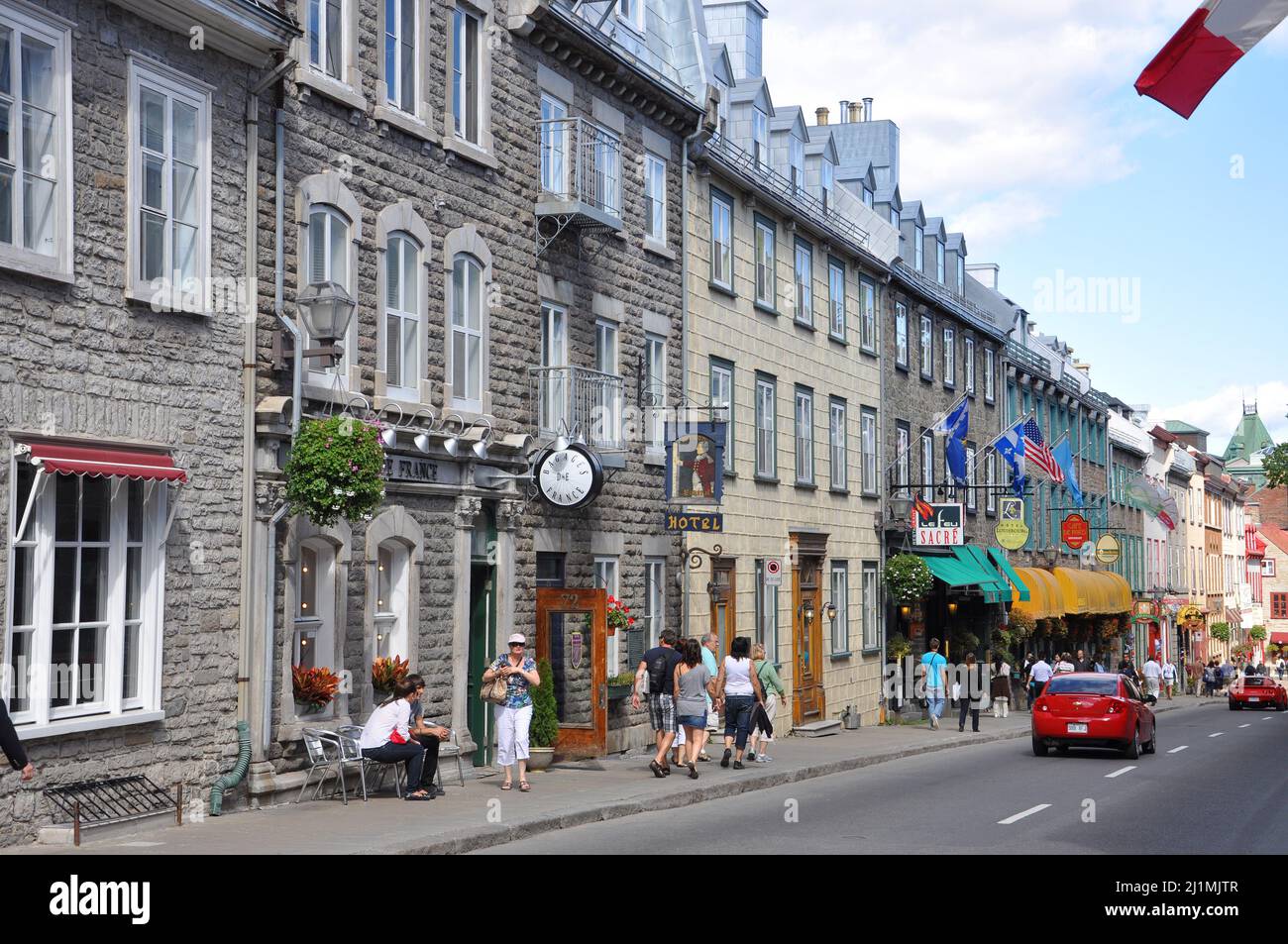 French style historic commercial building on Rue Saint-Louis Street in ...