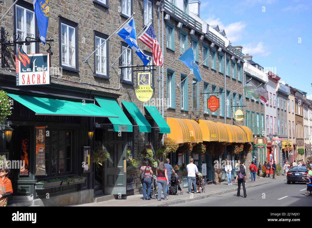 French style historic commercial building on Rue Saint-Louis Street in ...