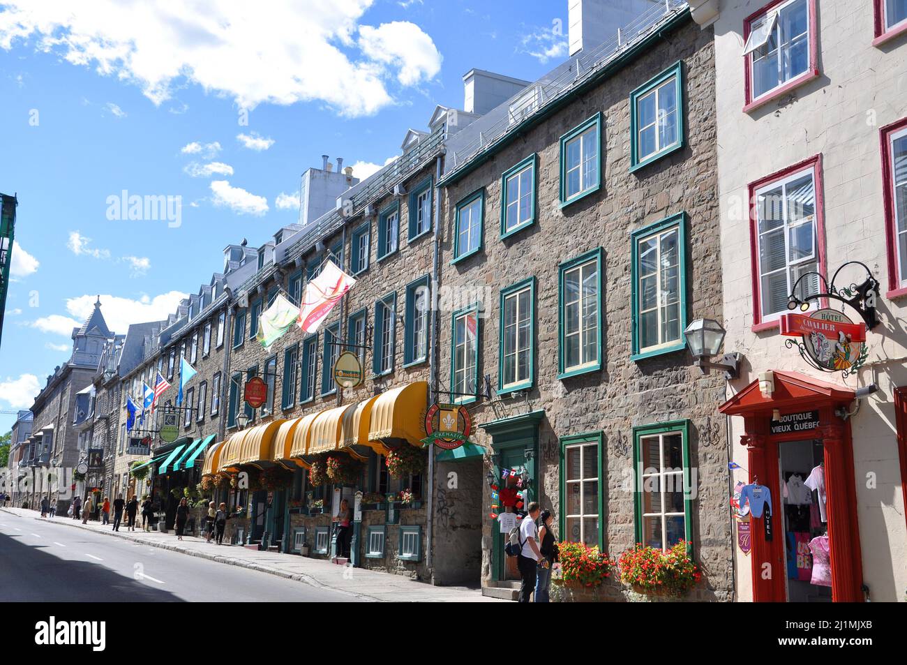 French style historic commercial building on Rue Saint-Louis Street in ...