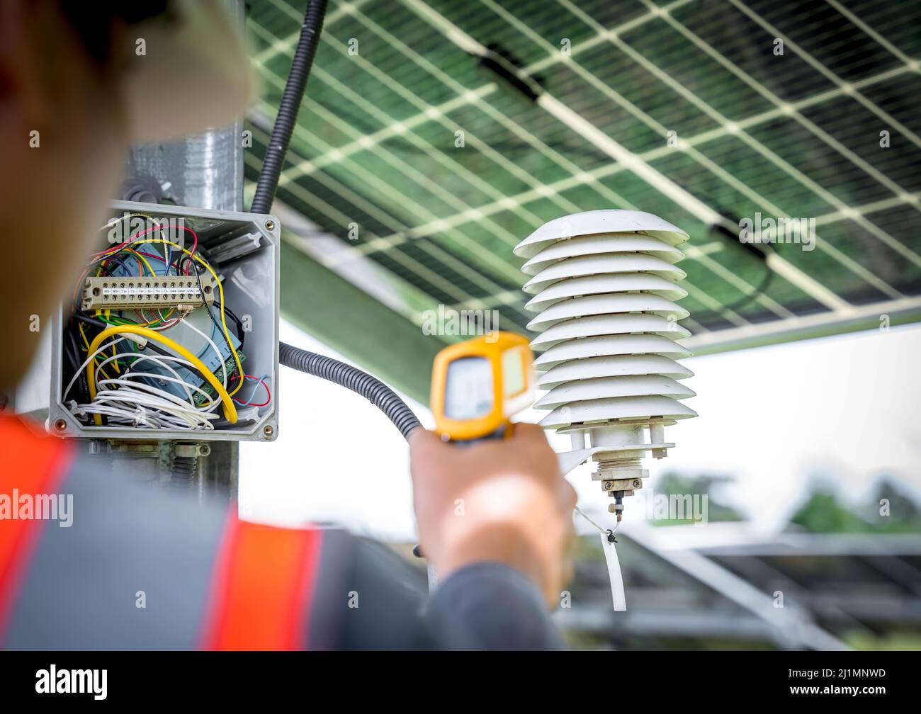 Technicians are checking the temperature of the ambient temp in the ...