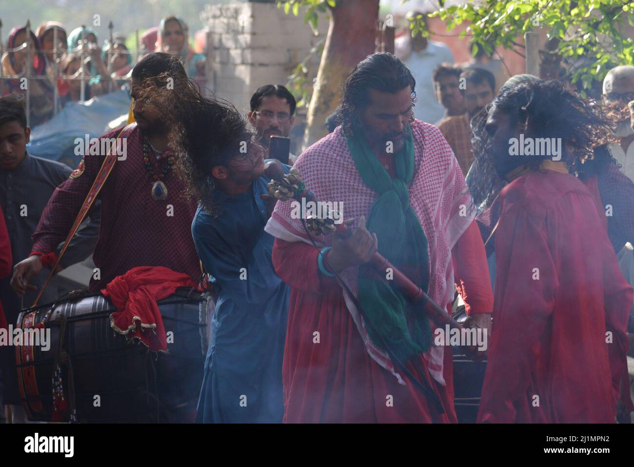 Pakistani devotees attend the three-days 434th annual Urs 'Festival of lights' at the shrine of ...