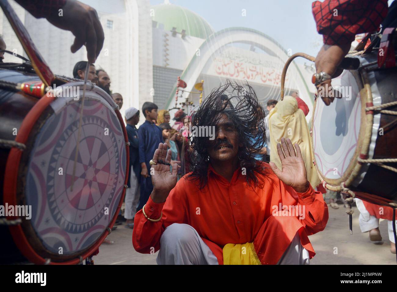 Pakistani devotees attend the three-days 434th annual Urs 'Festival of lights' at the shrine of ...