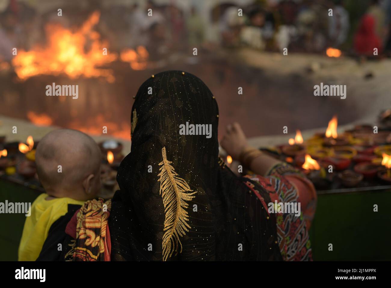 Pakistani devotees attend the three-days 434th annual Urs 'Festival of lights' at the shrine of ...