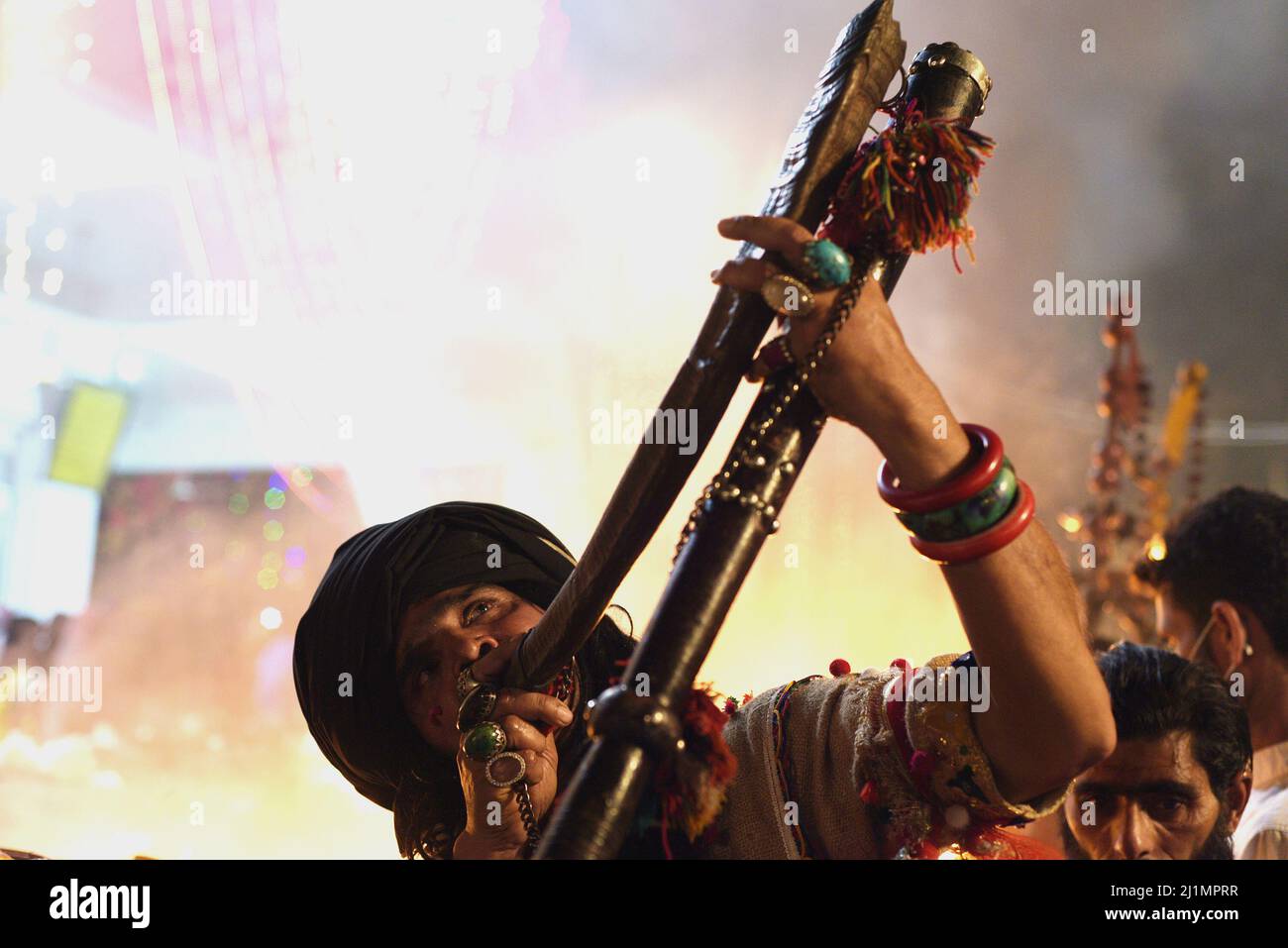 Pakistani devotees attend the three-days 434th annual Urs 'Festival of lights' at the shrine of ...