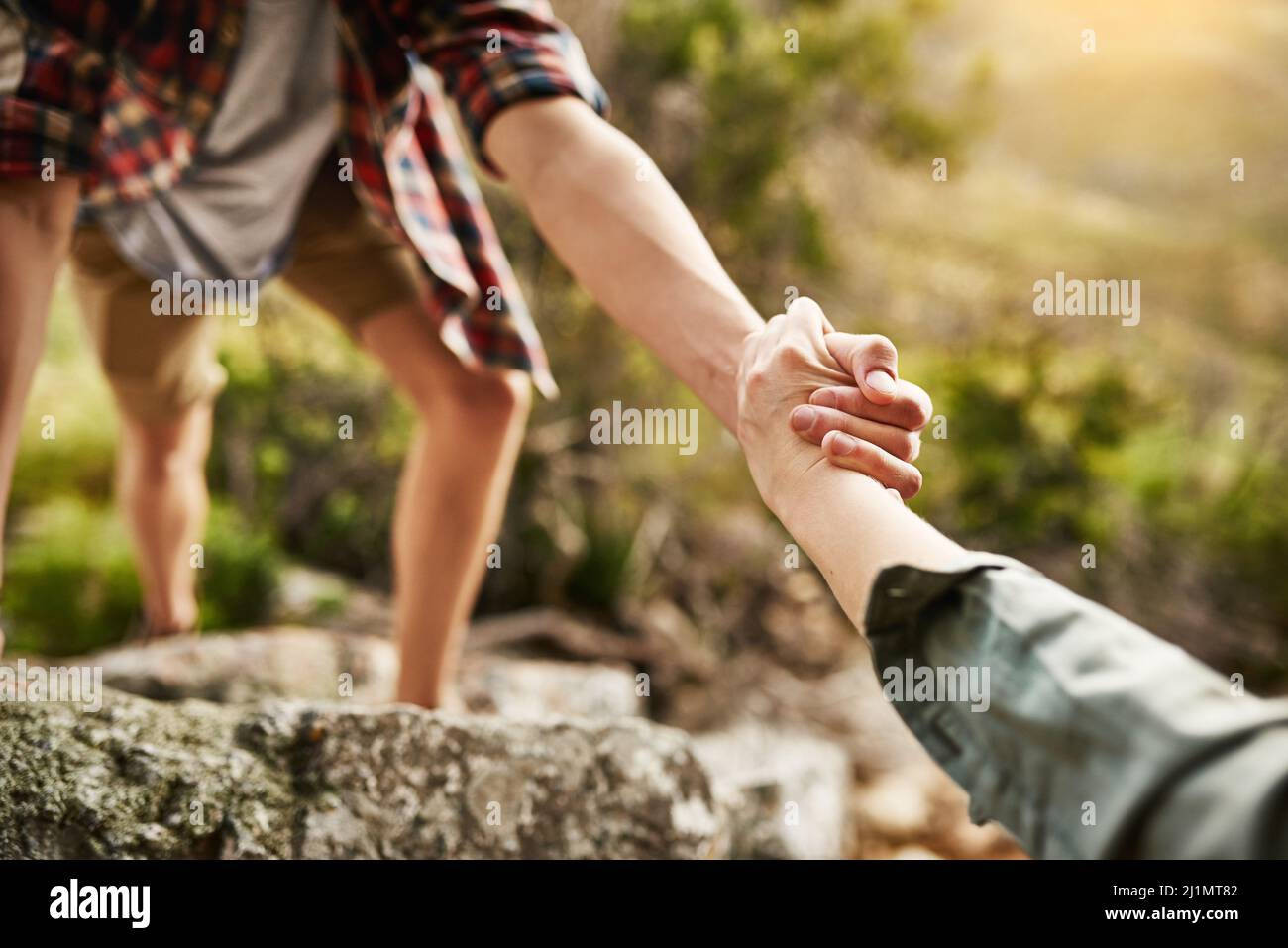 Teamwork couple hiking help other hi-res stock photography and images ...
