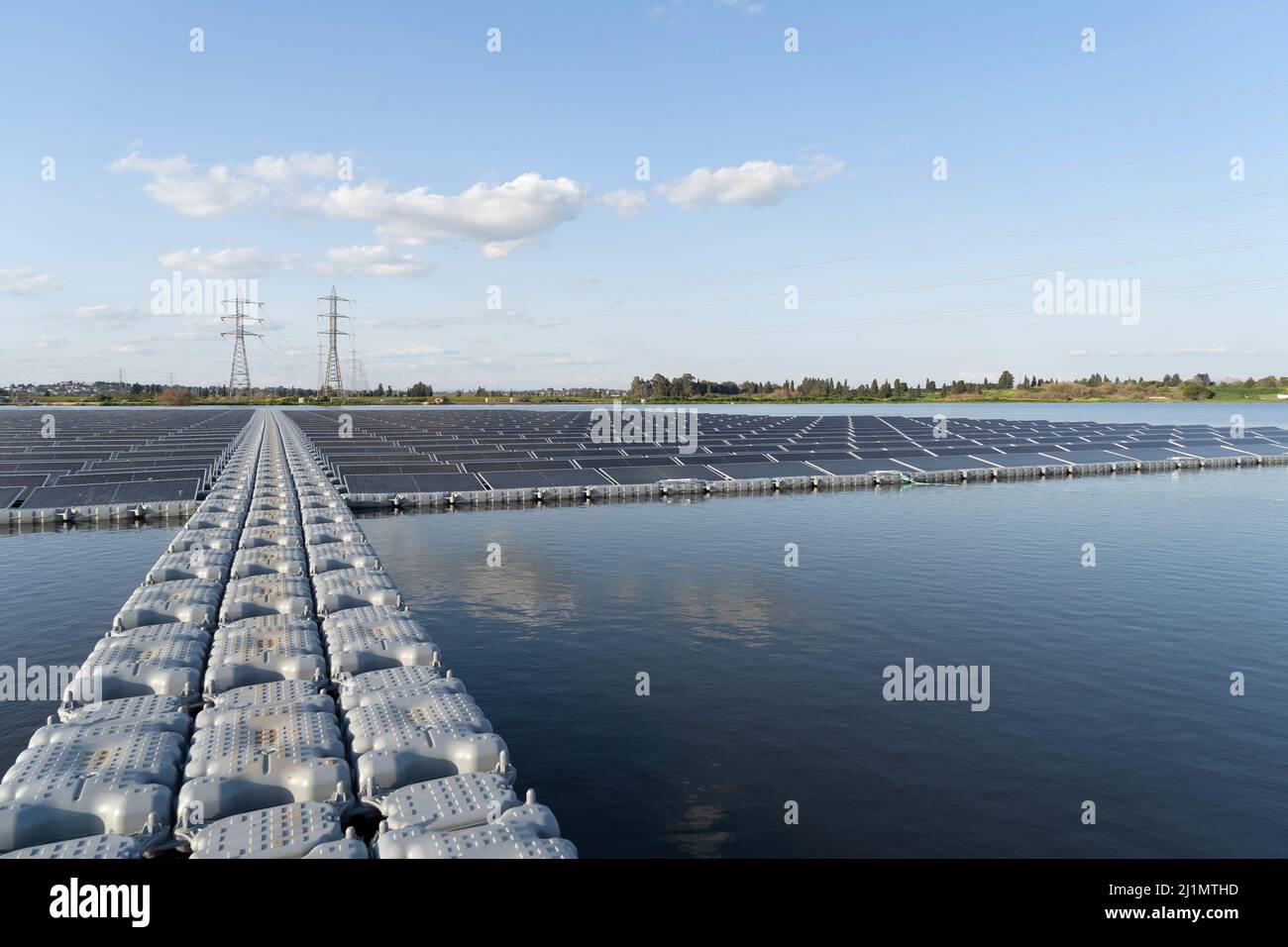 Solar panel farm on a fish pond for electricity generation Stock Photo ...