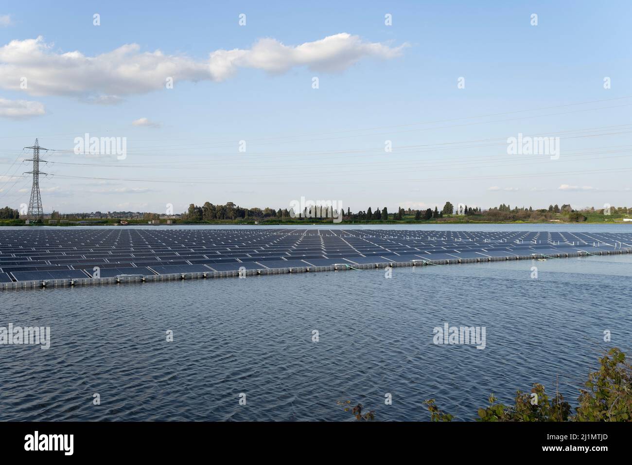 Solar panel farm on a fish pond for electricity generation Stock Photo ...