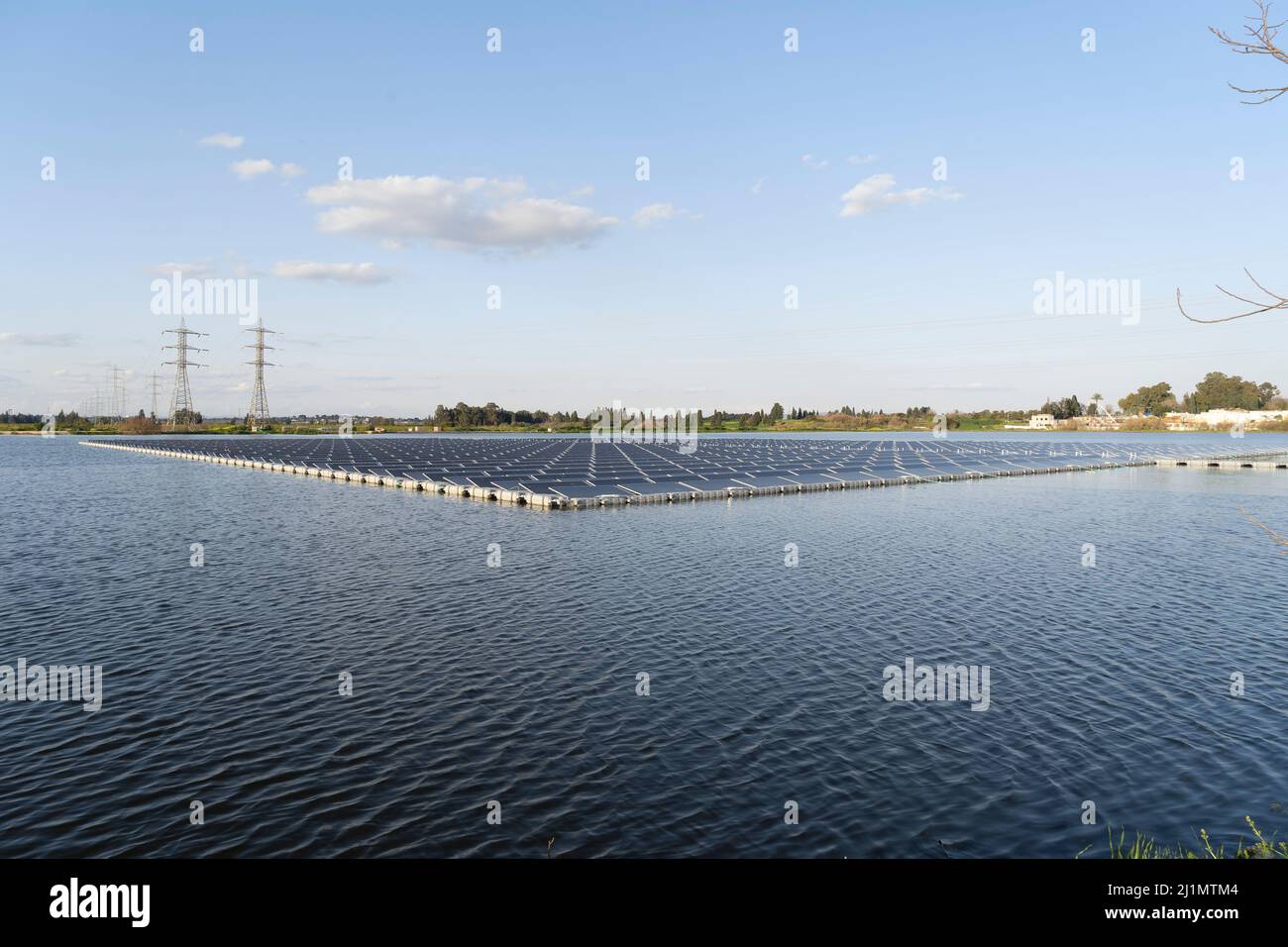 Solar panel farm on a fish pond for electricity generation Stock Photo ...