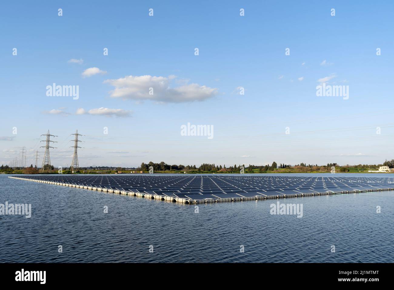 Solar panel farm on a fish pond for electricity generation Stock Photo ...
