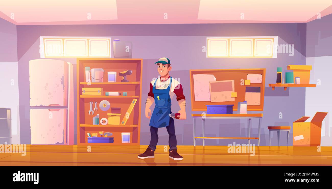 Repairman in garage with equipment for carpentry and repair works ...