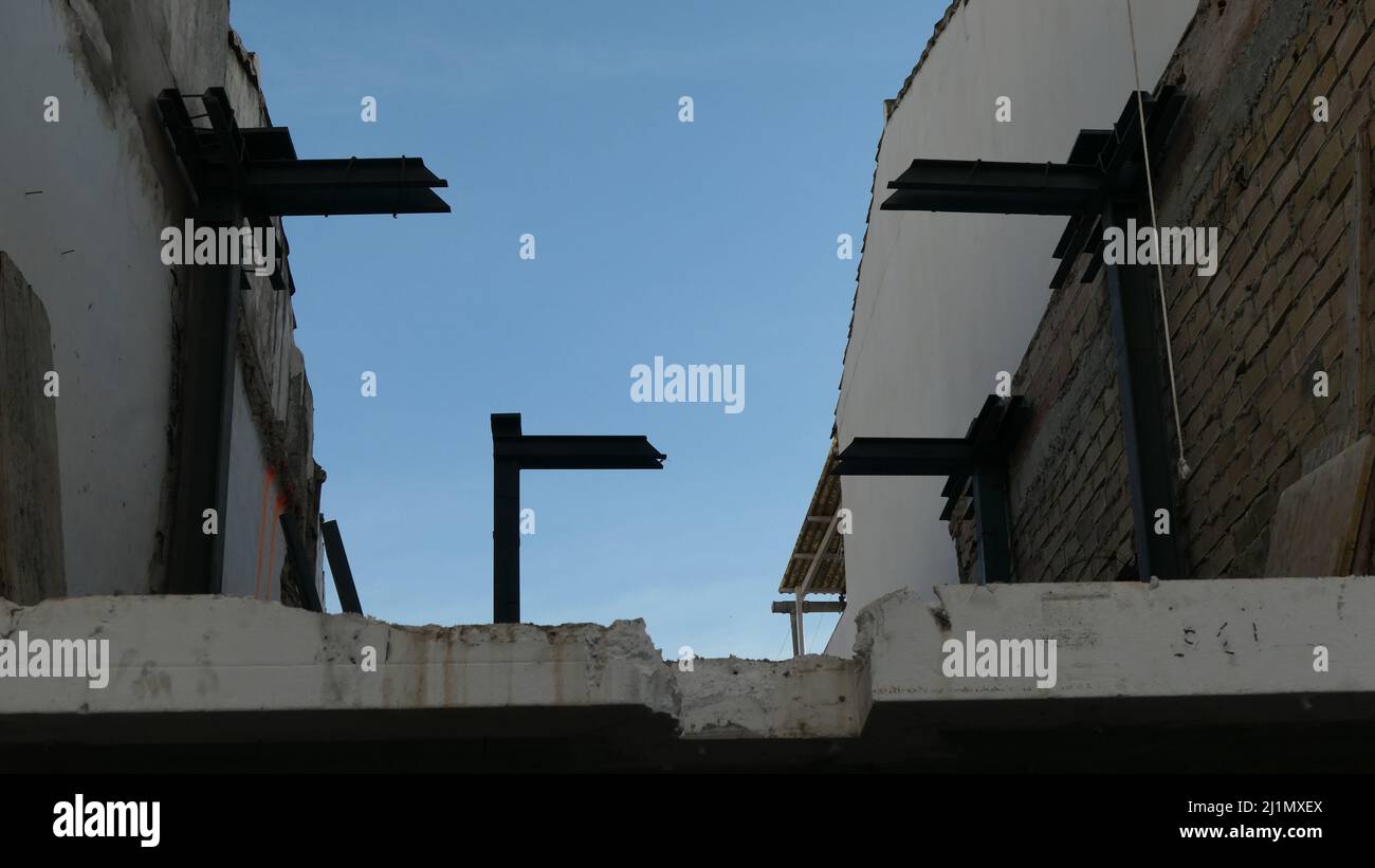 Heavy duty steel supports attached to wall at town centre building site ...