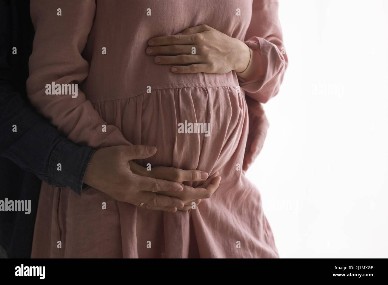 Happy young future parents waiting for childbirth Stock Photo - Alamy