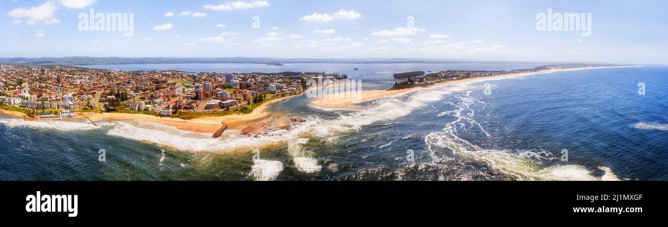 Tuggerah lake enters the Pacific ocean at The Entrance town on ...