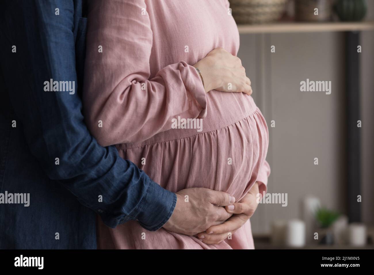 Happy parents waiting for baby hi-res stock photography and images - Alamy