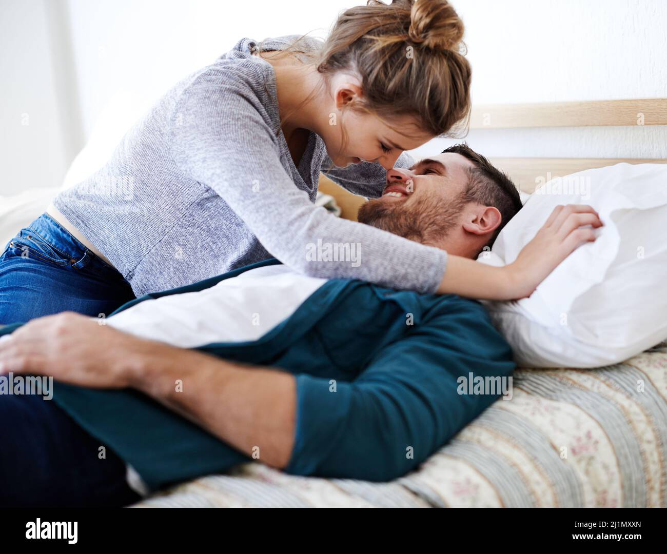 Young couple lying down side by side hi-res stock photography and ...