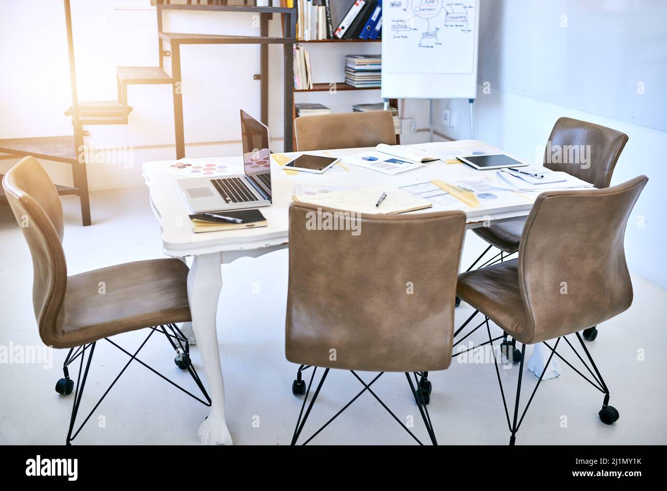 Ready and prepped for a meeting. Shot of a table in an empty meeting ...