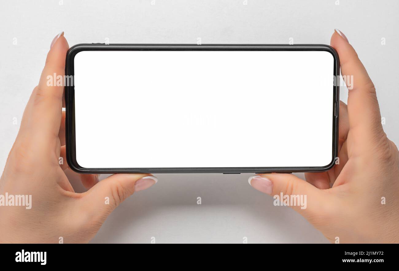 cell phone mockup in horizontal position. watching streaming video on ...
