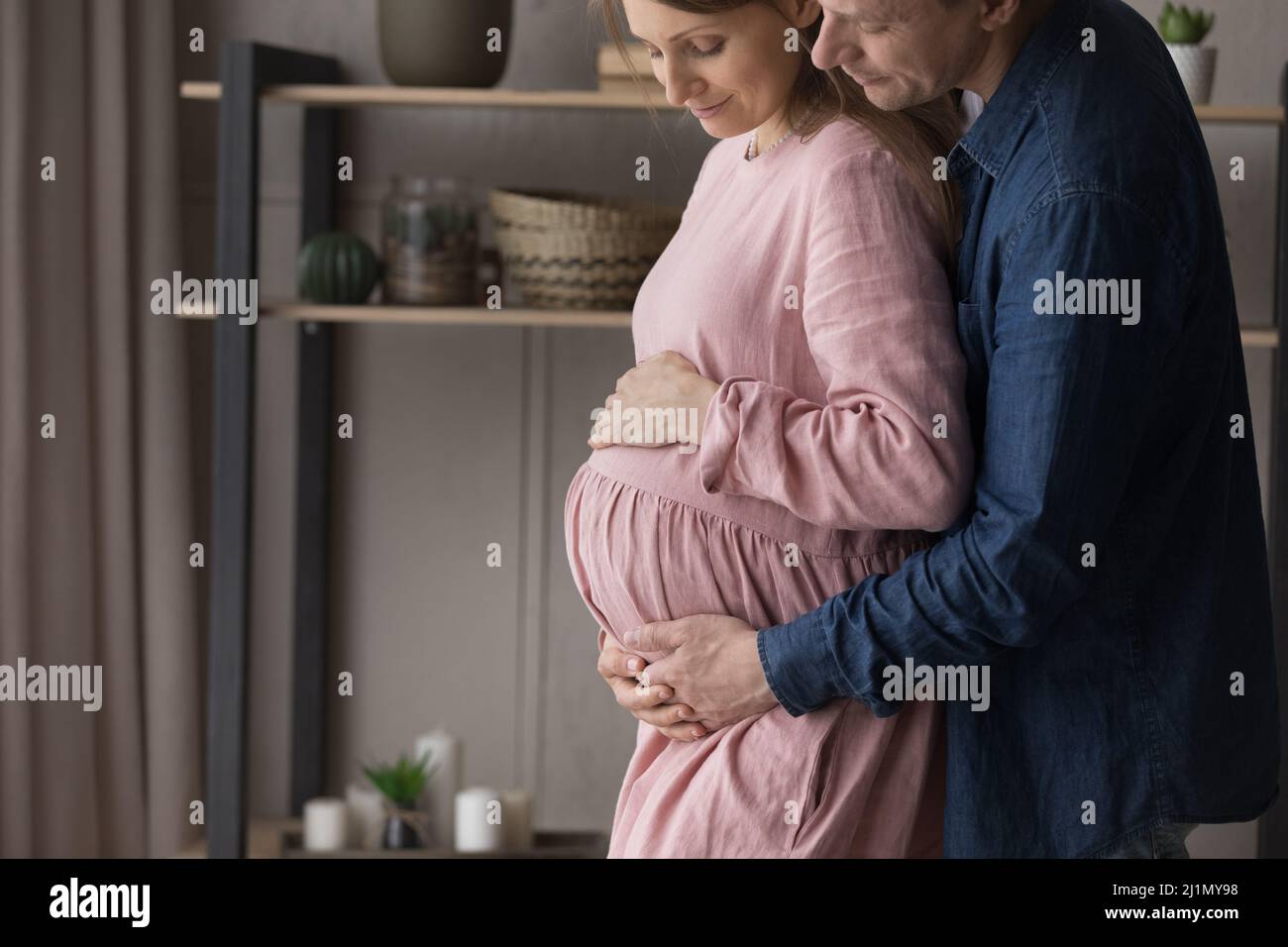 Bonding happy young future parents waiting for childbirth Stock Photo ...