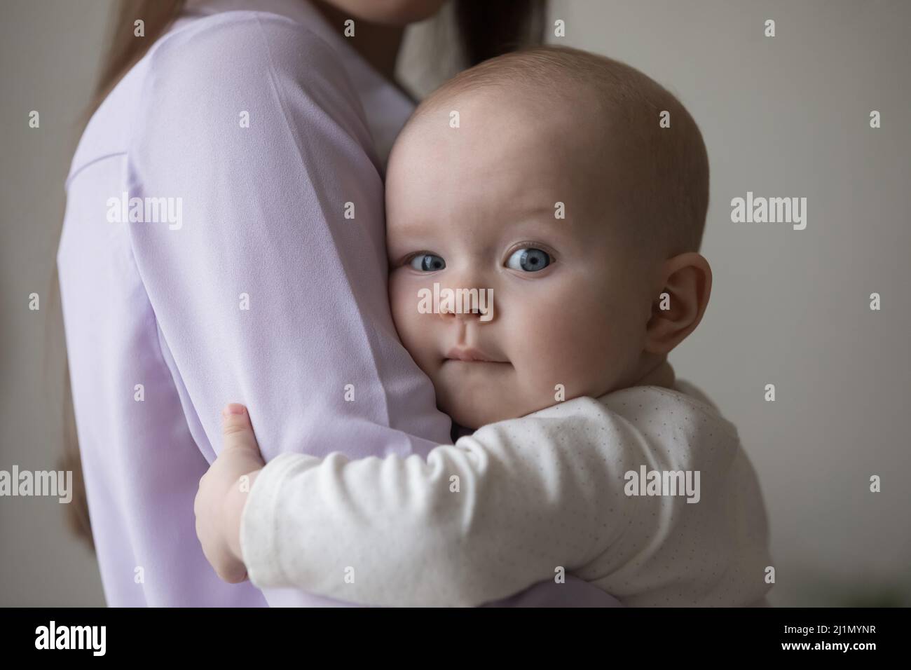 Young woman cuddling sweet adorable newborn baby Stock Photo - Alamy Young woman cuddling sweet adorable newborn baby Stock Photo - Alamy