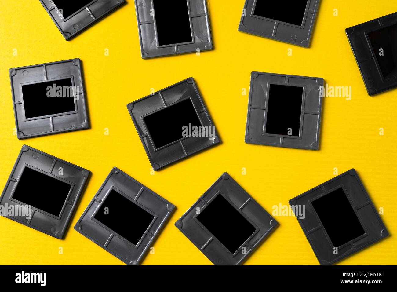 Photography empty slide frames on yellow background Stock Photo - Alamy