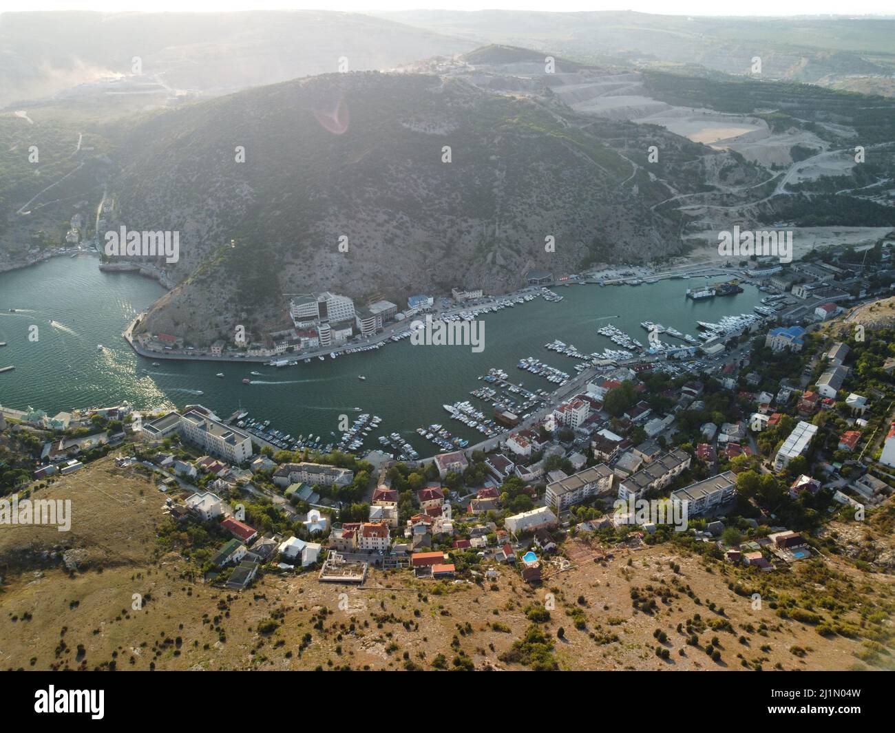 Aerial panoramic view of Balaklava landscape with boats and sea in ...