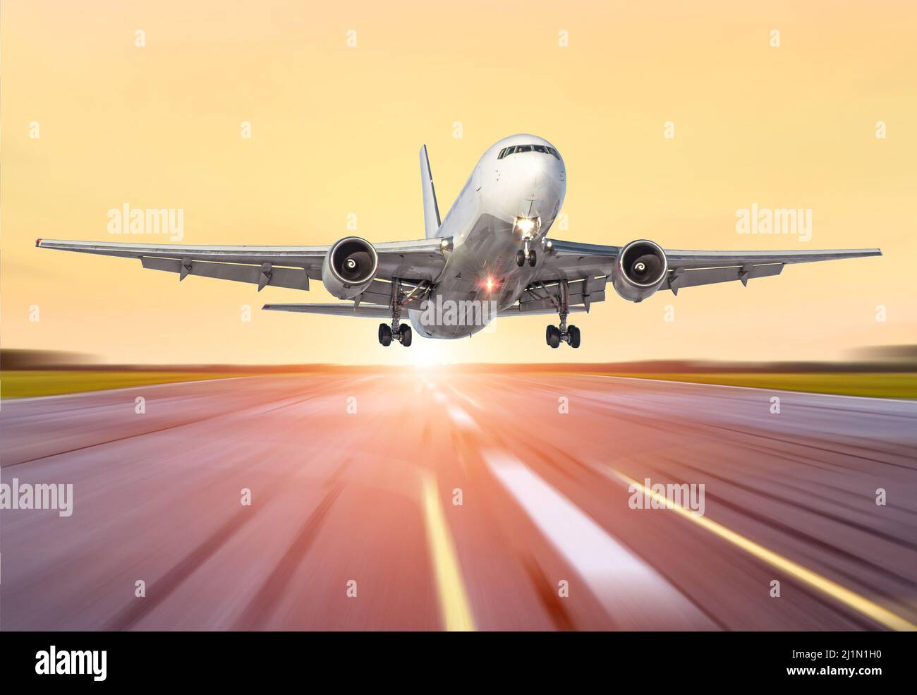 Big airplane in motion take off the evening sky sunset sunrise sun ...