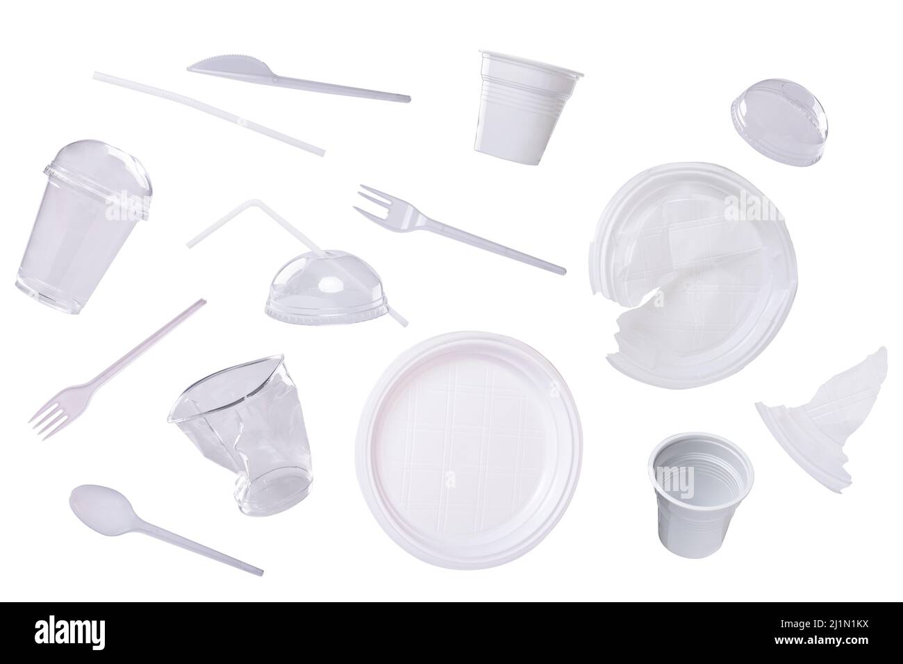 Used plastic dinnerware isolated on white background Stock Photo - Alamy