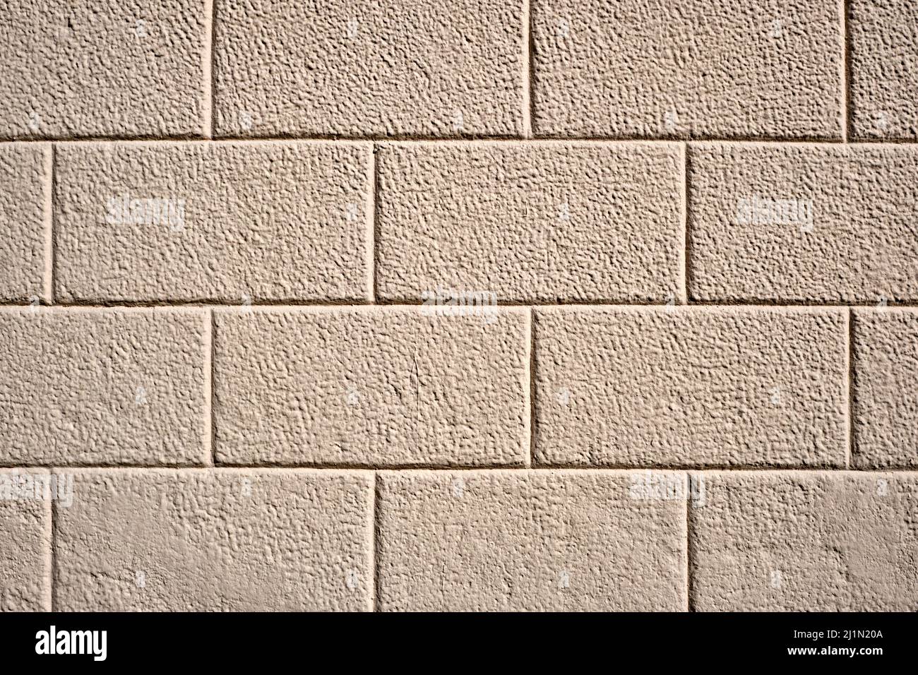 Background from a wall with rectangular beige stone slabs Stock Photo ...