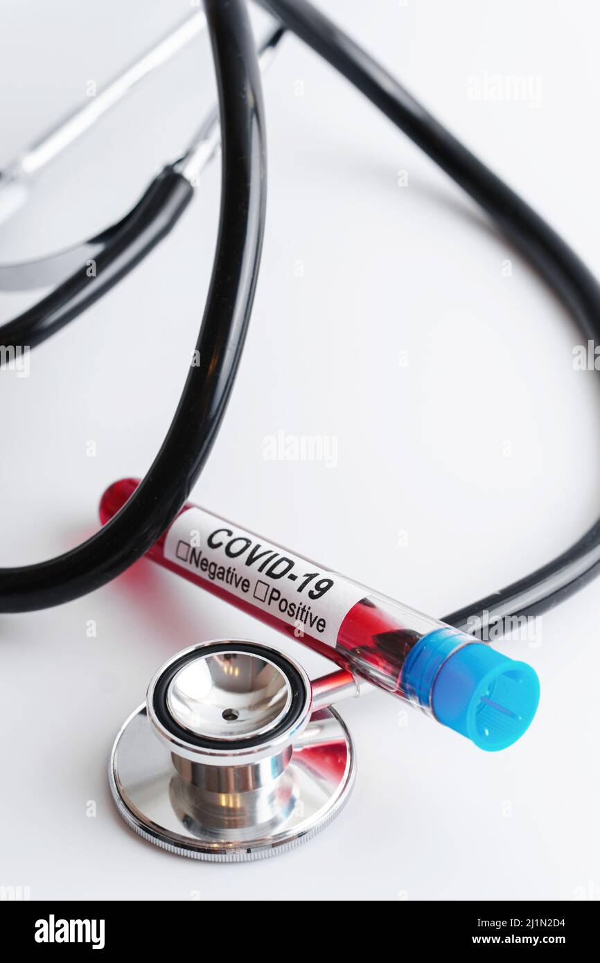 Blood samples and stethoscope on white background Stock Photo - Alamy