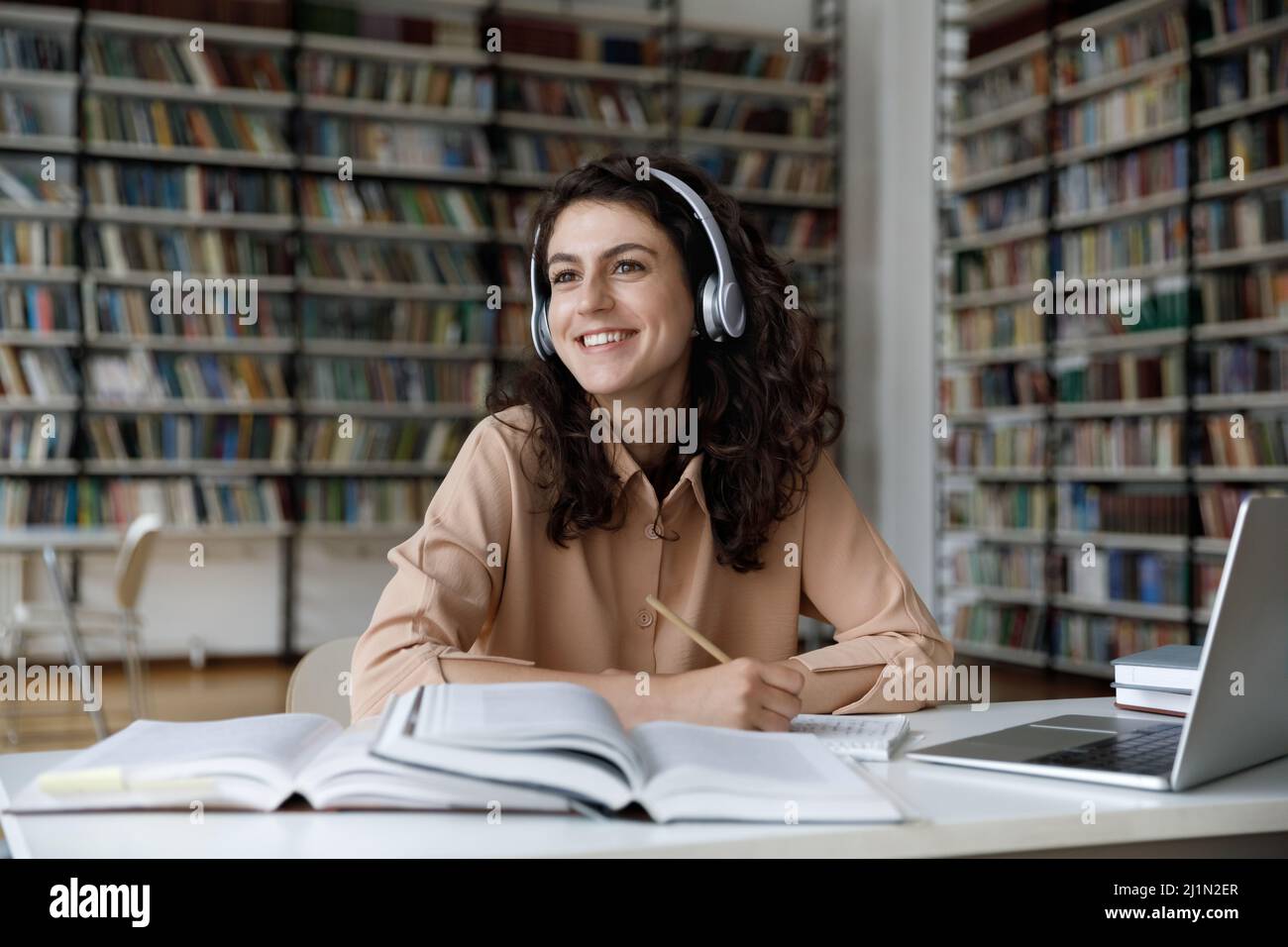 University student alone at desk hi-res stock photography and images ...
