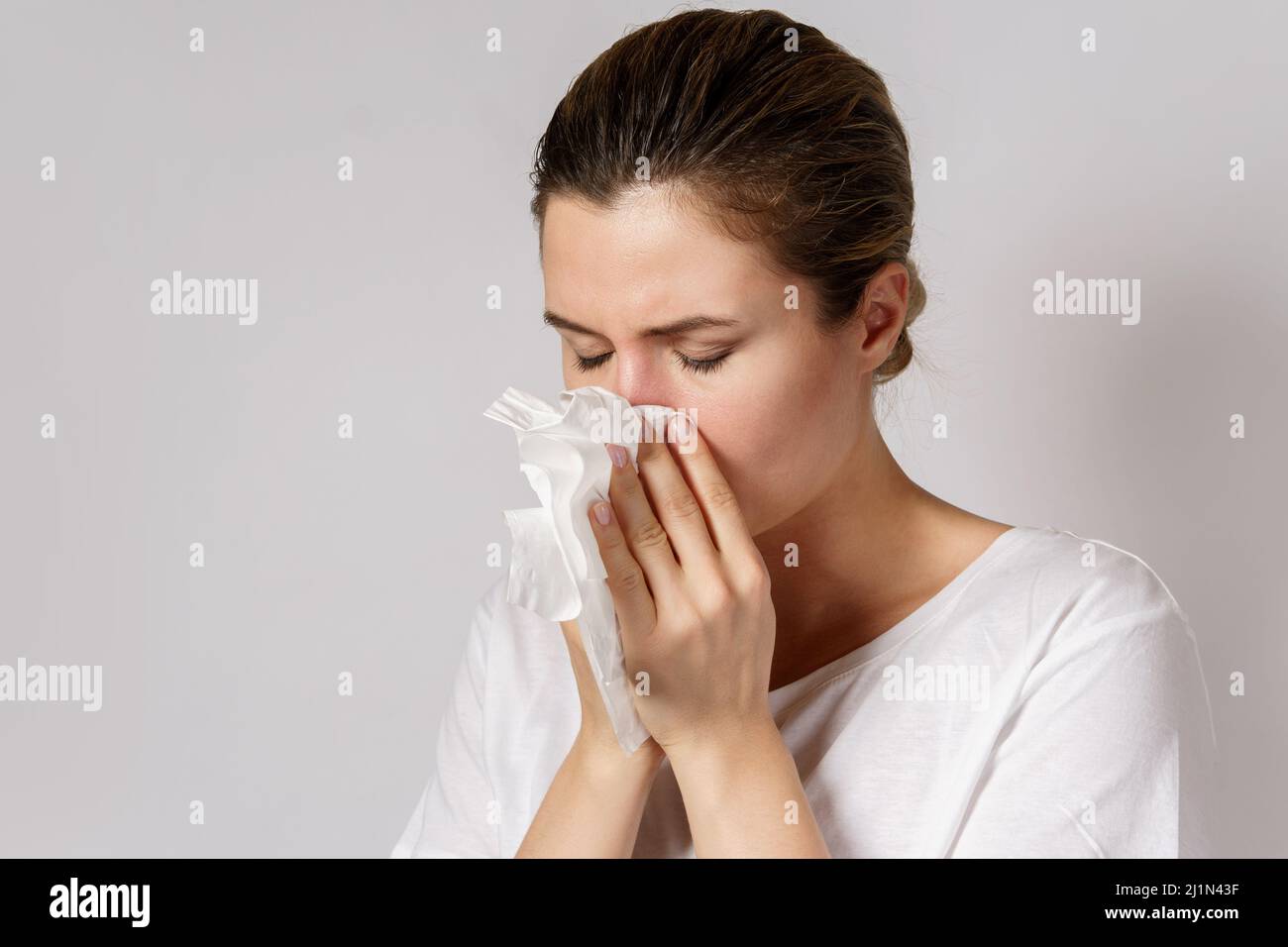 Sneeze on a runny nose hi-res stock photography and images - Alamy