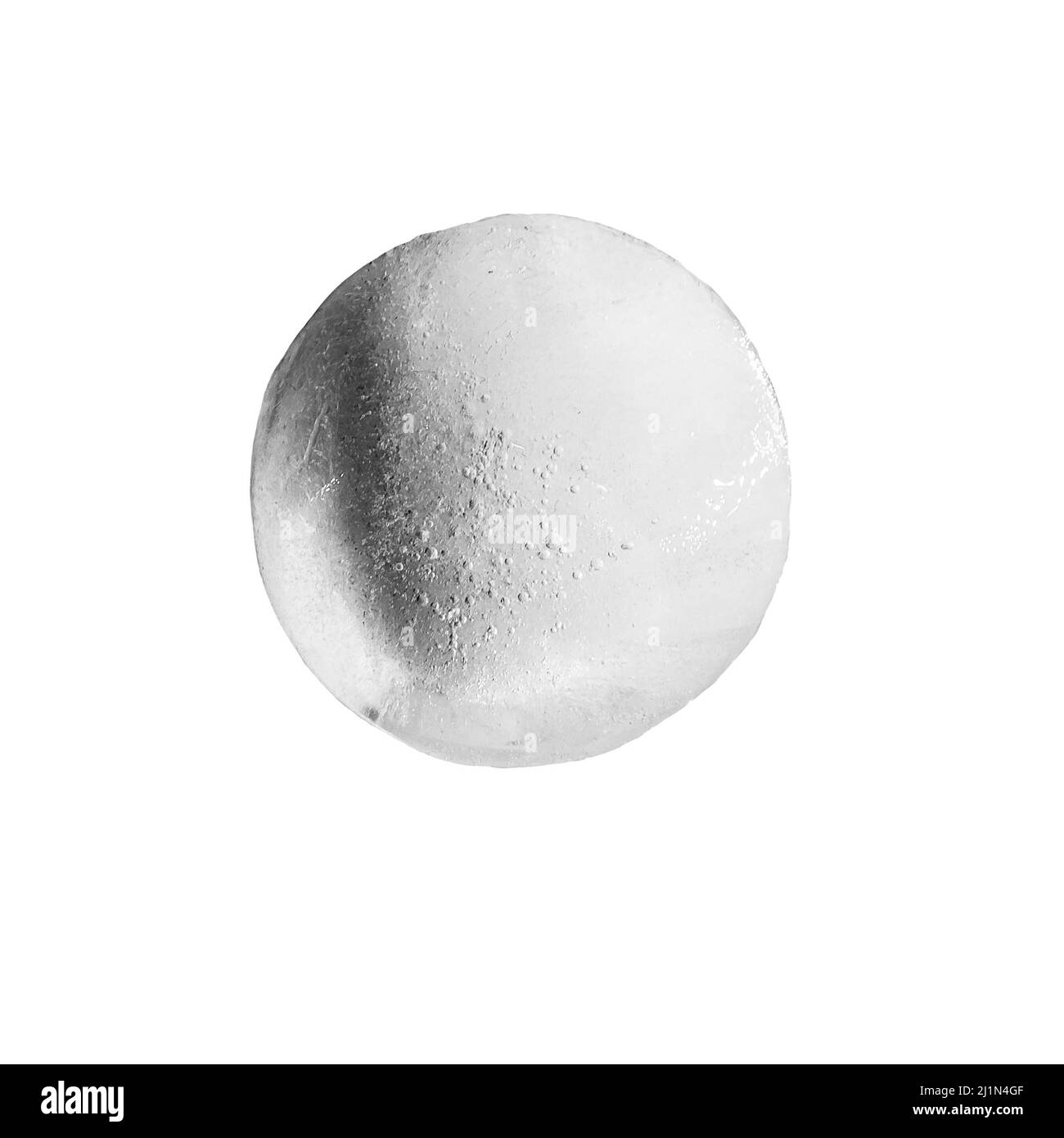 Isolated round ice cube out of real ice as a studio shot with a white ...