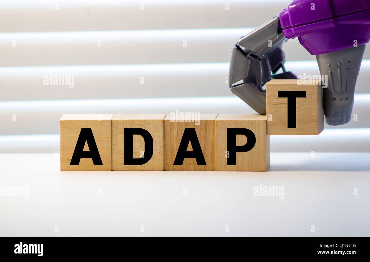 ADAPT word made with building blocks concept Stock Photo - Alamy