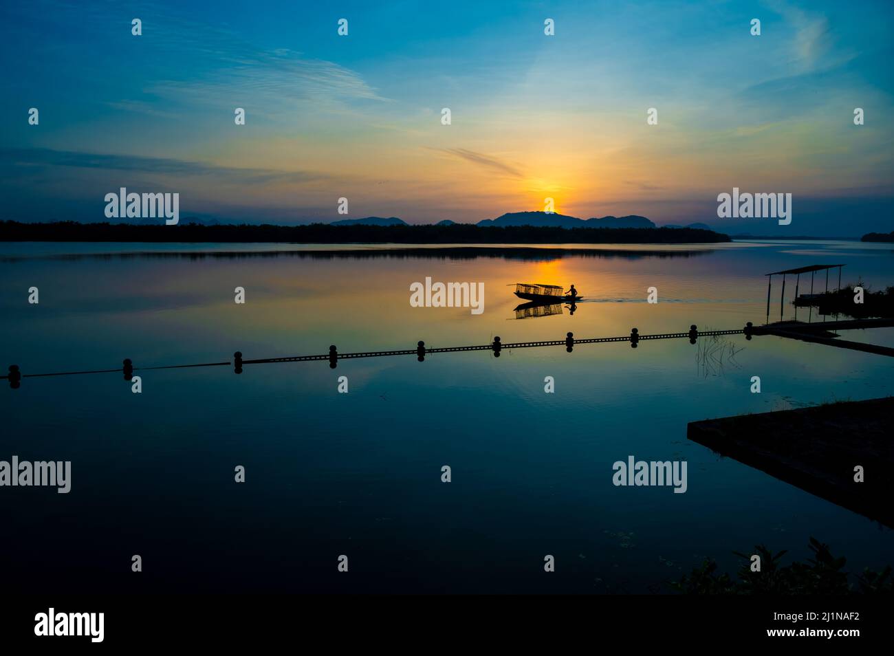 Sunset river boat beautiful peace of place Stock Photo - Alamy