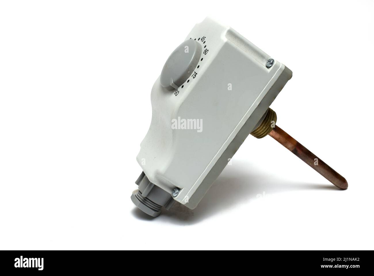 Close up of grey temperature thermostat with copper metal sensor needle ...