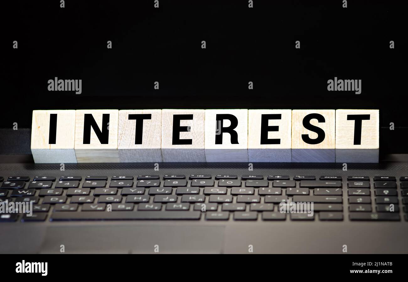 INTEREST word made with building blocks, concept Stock Photo - Alamy
