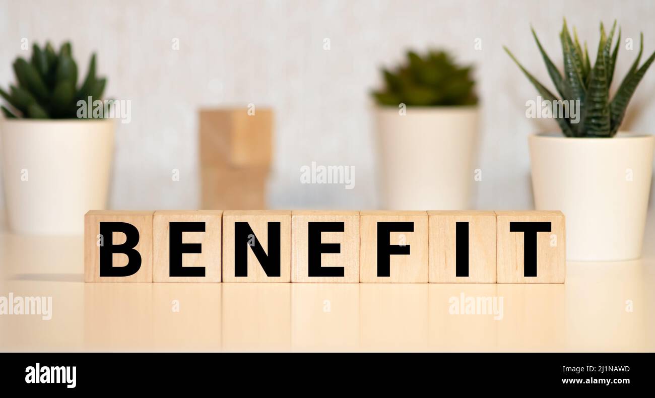 BENEFITS word made with building blocks, concept Stock Photo - Alamy